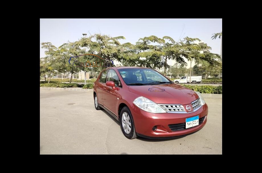 Tiida Nissan 2010 Madinaty Red 6874914 - Car for sale : Hatla2ee