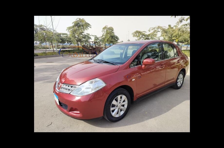 Tiida Nissan 2010 Madinaty Red 6874914 - Car for sale : Hatla2ee