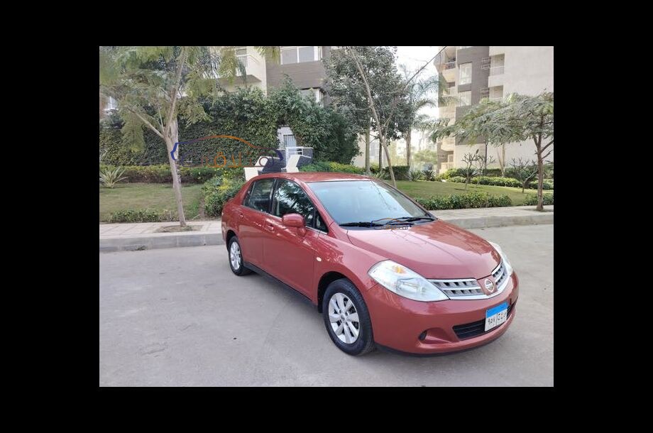 Tiida Nissan 2010 Madinaty Red 6874914 - Car for sale : Hatla2ee