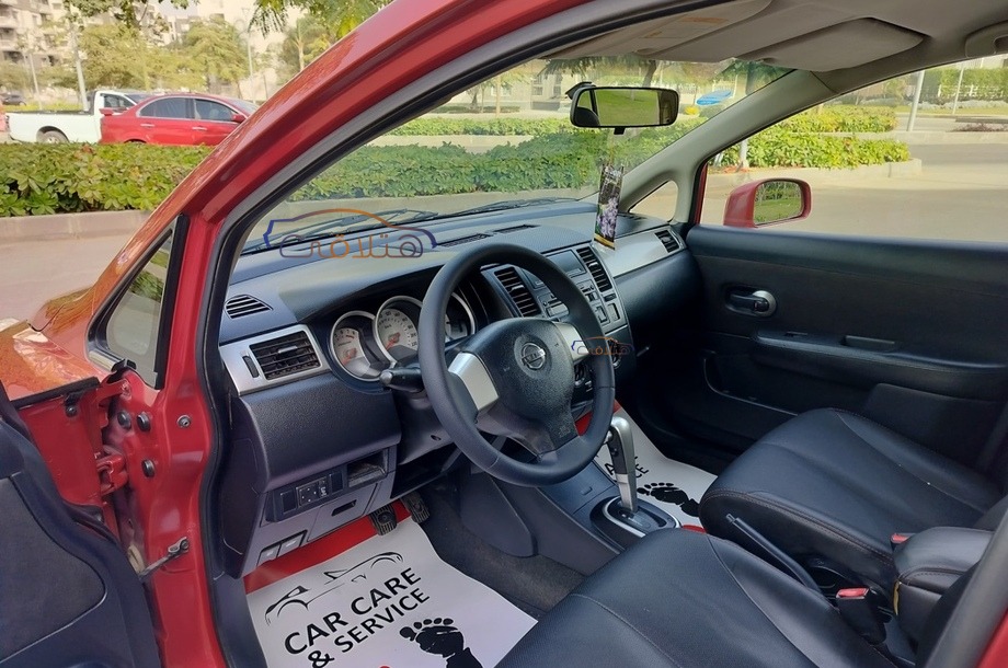 Tiida Nissan 2010 Madinaty Red 6874914 - Car for sale : Hatla2ee