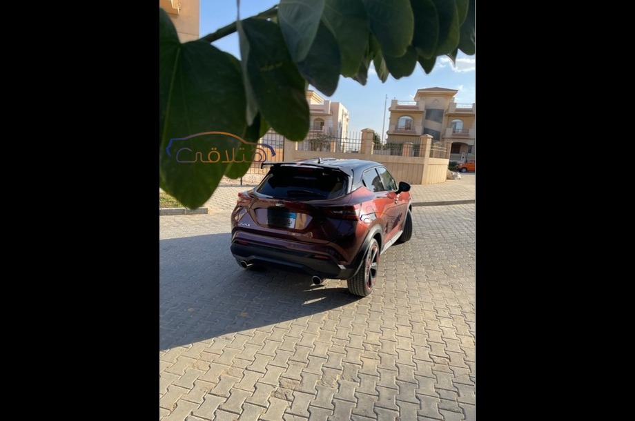 Juke Nissan 2021 6 October Red 6877057 - Car for sale : Hatla2ee