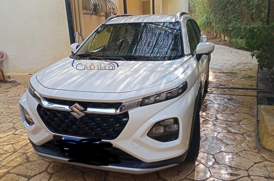 Fronx Suzuki 2024 Sheikh Zayed City White 6878389 - Car for sale : Hatla2ee