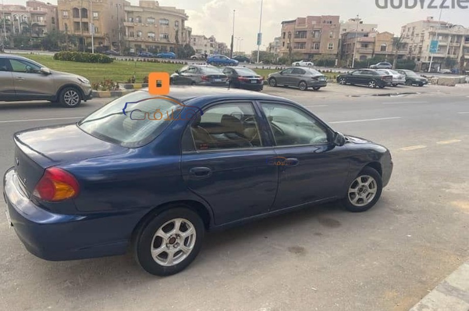 Spectra Kia 2003 Luxor Dark blue 6879321 - Car for sale : Hatla2ee