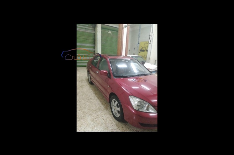 Lancer Puma Mitsubishi 2009 Dyarb Negm Red 6880148 - Car for sale ...