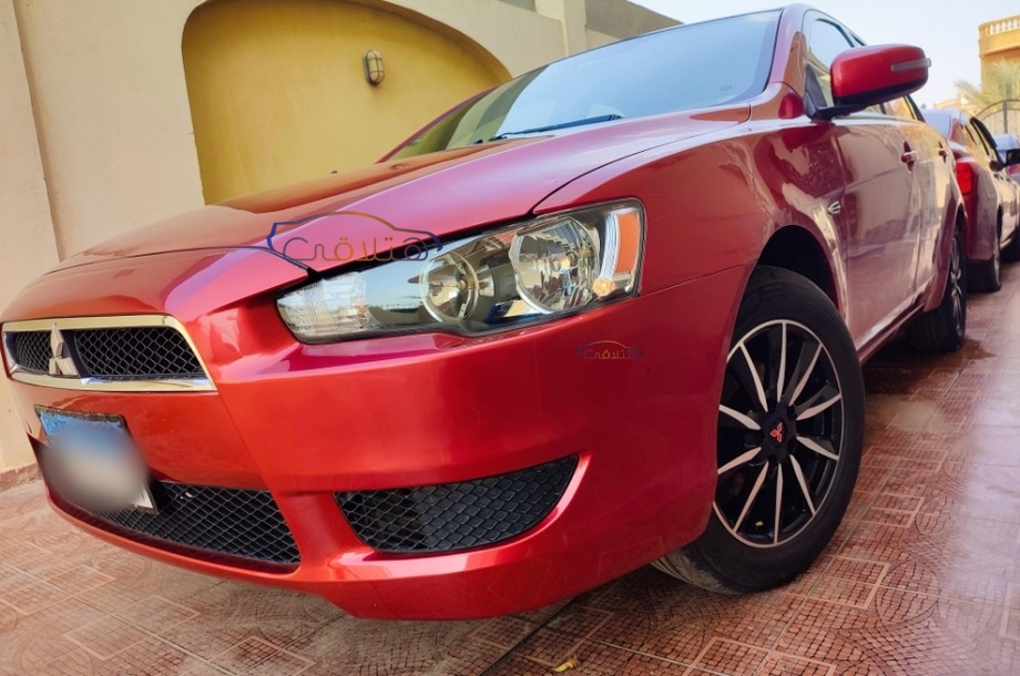 Lancer EX Shark Mitsubishi 2016 10th of Ramadan Red 6882352 - Car for ...