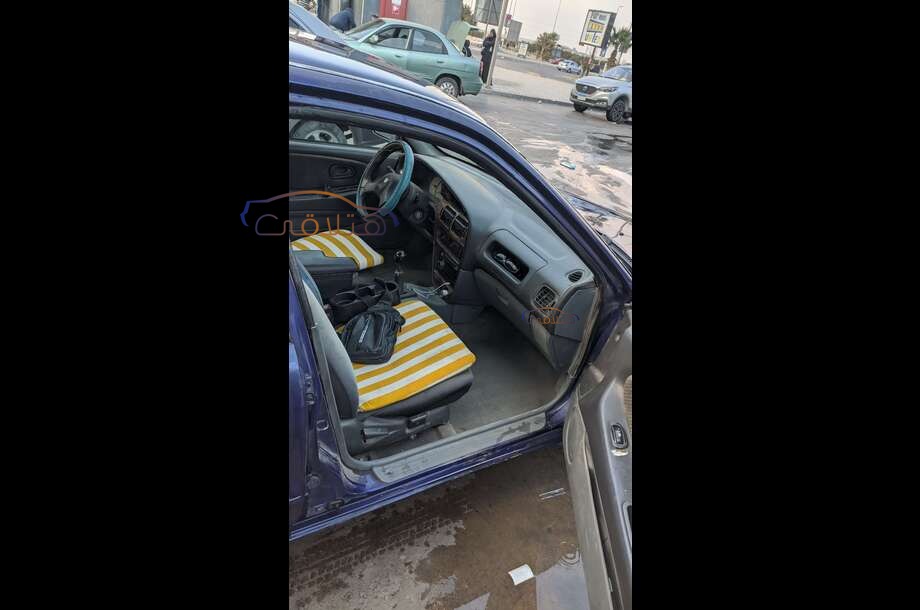 Wira Proton 2000 6 October Dark blue 6883688 - Car for sale : Hatla2ee