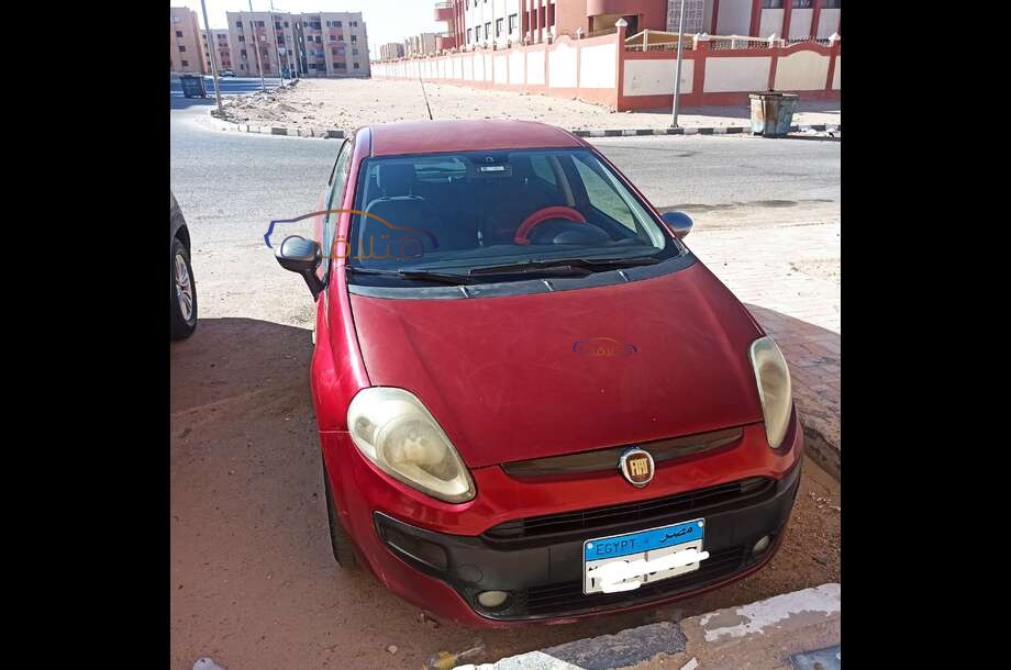 Punto evo Fiat 2012 Cairo Dark red 6885568 - Car for sale : Hatla2ee