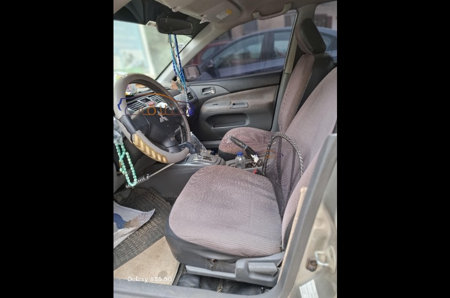 Lancer Puma Mitsubishi Nasr city Silver 6887282 - Car for sale : Hatla2ee