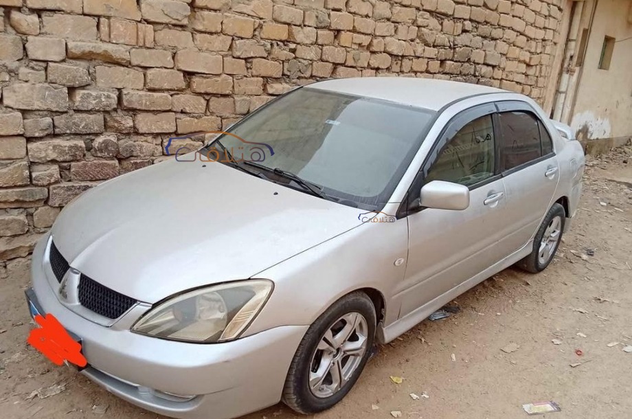 Lancer Puma Mitsubishi 2007 Cairo Silver 6888191 - Car for sale : Hatla2ee