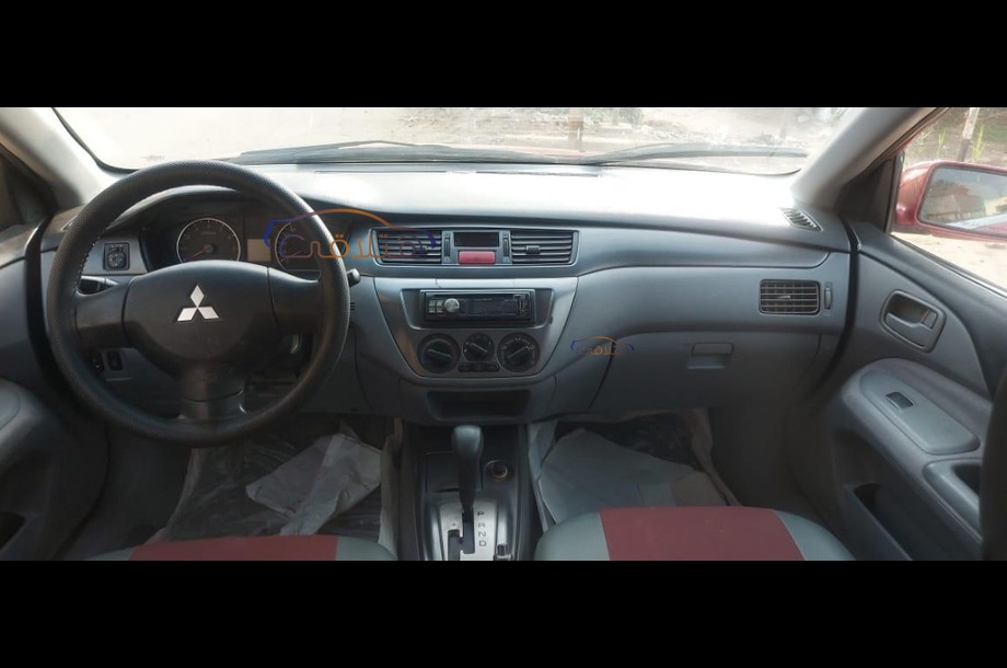 Lancer Puma Mitsubishi 2013 Mit Ghamr Red 6888817 - Car for sale : Hatla2ee