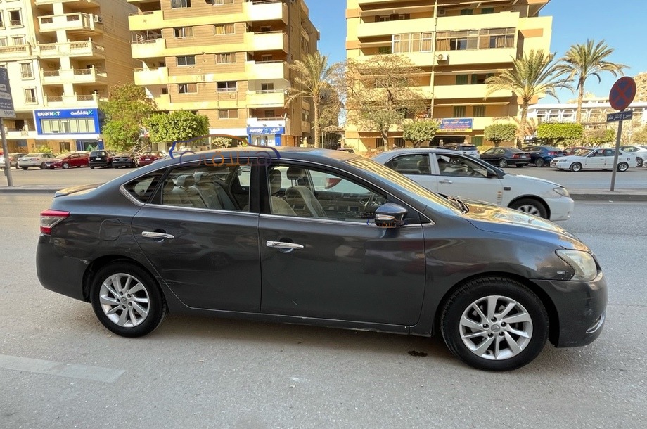 Sentra Nissan 2015 Nasr city Silver 6889495 - Car for sale : Hatla2ee
