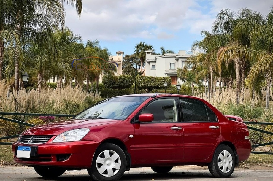 Lancer Mitsubishi 2004 Cairo Red 6889843 - Car for sale : Hatla2ee