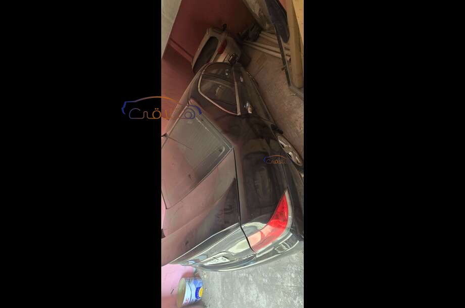 Lancer Puma Mitsubishi 2009 Asyut Black 6890313 - Car for sale : Hatla2ee