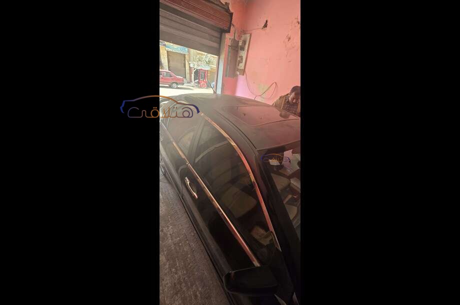 Lancer Puma Mitsubishi 2009 Asyut Black 6890313 - Car for sale : Hatla2ee