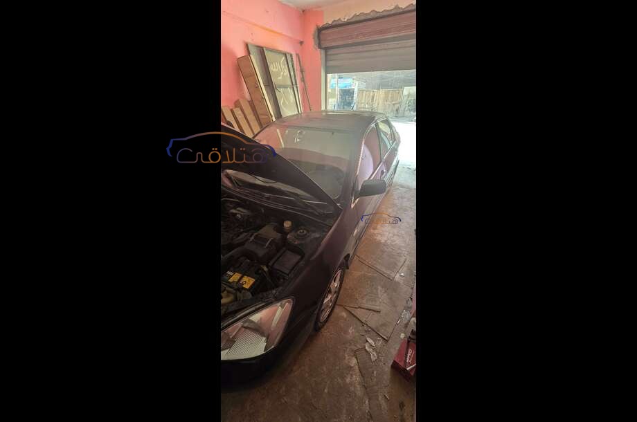 Lancer Puma Mitsubishi 2009 Asyut Black 6890313 - Car for sale : Hatla2ee