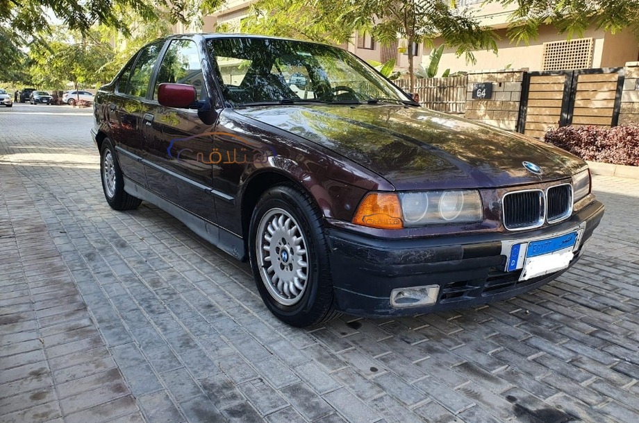 316 BMW 1994 Maadi Dark red 6892448 - Car for sale : Hatla2ee