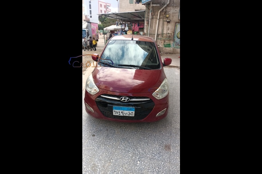 I10 Hyundai 2013 Alexandria Dark red 6893209 - Car for sale : Hatla2ee