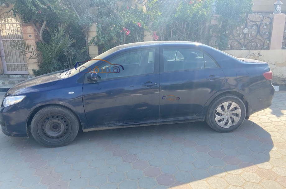 Corolla Toyota 2008 6 October Dark blue 6894105 - Car for sale : Hatla2ee