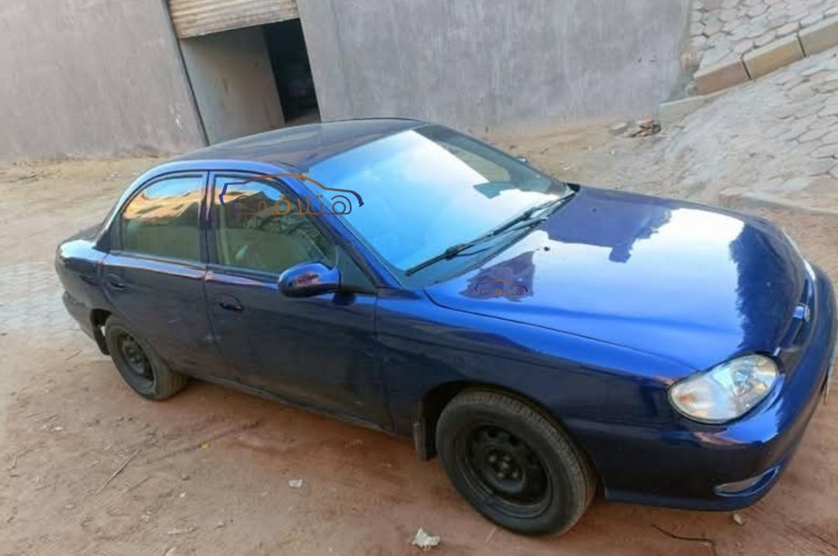 Sephia Kia 2001 6 October Dark blue 6895061 - Car for sale : Hatla2ee