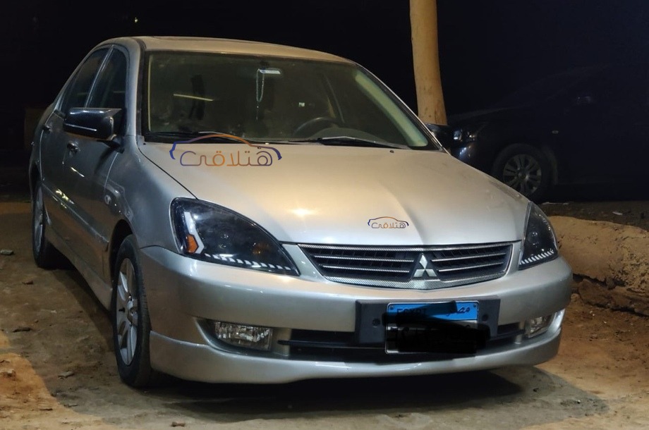 Lancer Puma Mitsubishi 2010 Dakahlia Silver 6900585 - Car for sale ...