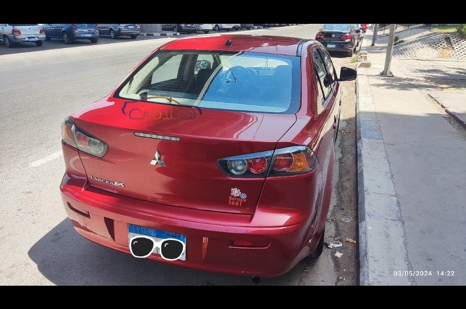 Lancer EX Shark Mitsubishi 2015 Cairo Red 6902356 - Car for sale : Hatla2ee