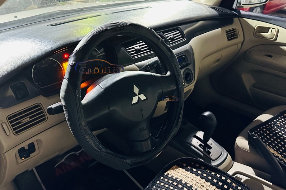 Lancer Puma Mitsubishi 2013 Cairo Silver 6902549 - Car for sale : Hatla2ee