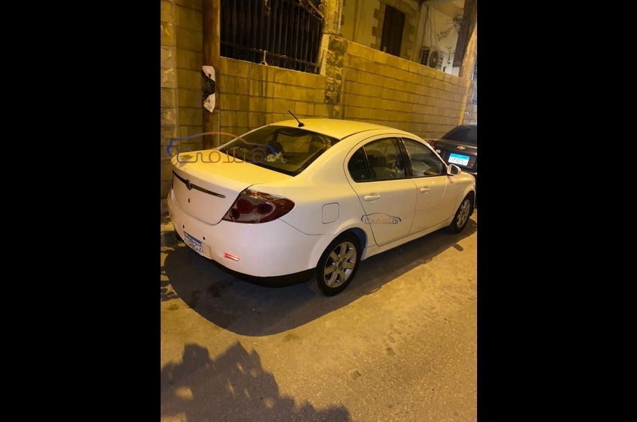 Persona Proton 2009 Alexandria White 6903385 - Car for sale : Hatla2ee