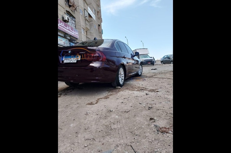 316 BMW 2009 Alexandria Dark red 6904563 - Car for sale : Hatla2ee