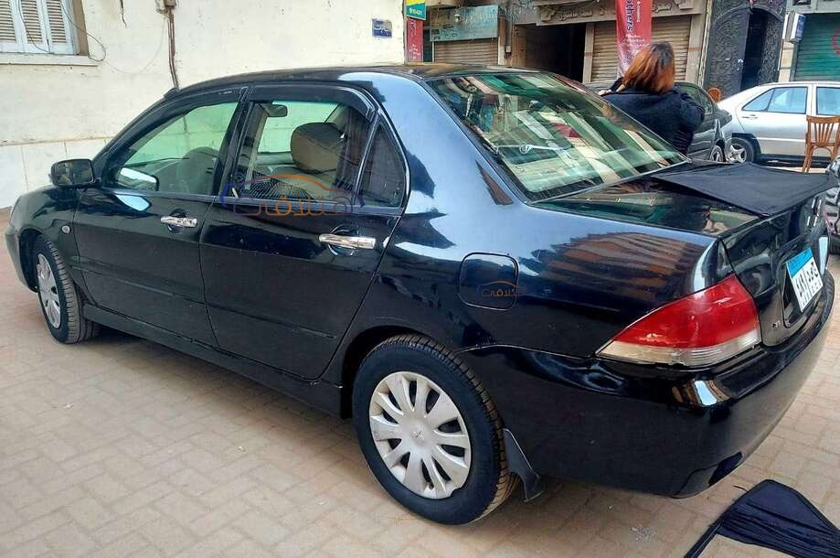 Lancer Puma Mitsubishi 2008 Shobra Black 6905627 - Car for sale : Hatla2ee