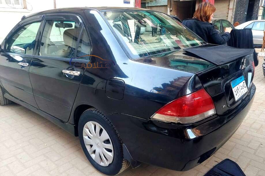 Lancer Puma Mitsubishi 2008 Shobra Black 6905627 - Car for sale : Hatla2ee