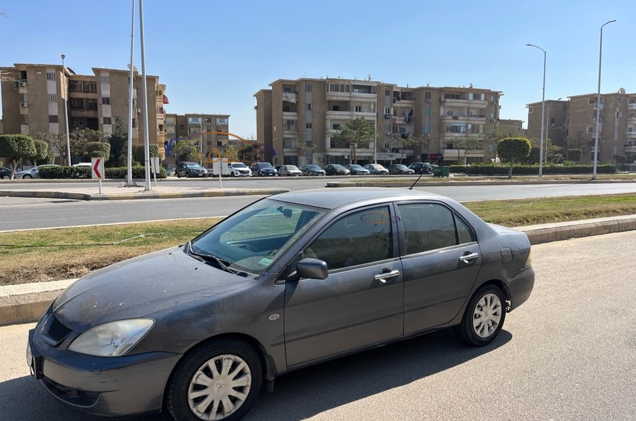 Lancer Puma Mitsubishi 2011 Giza Gray 6906668 - Car for sale : Hatla2ee