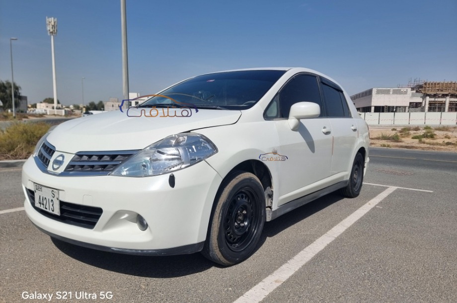 Tiida Nissan 2007 Dubai White 6907389 - Car for sale : Hatla2ee