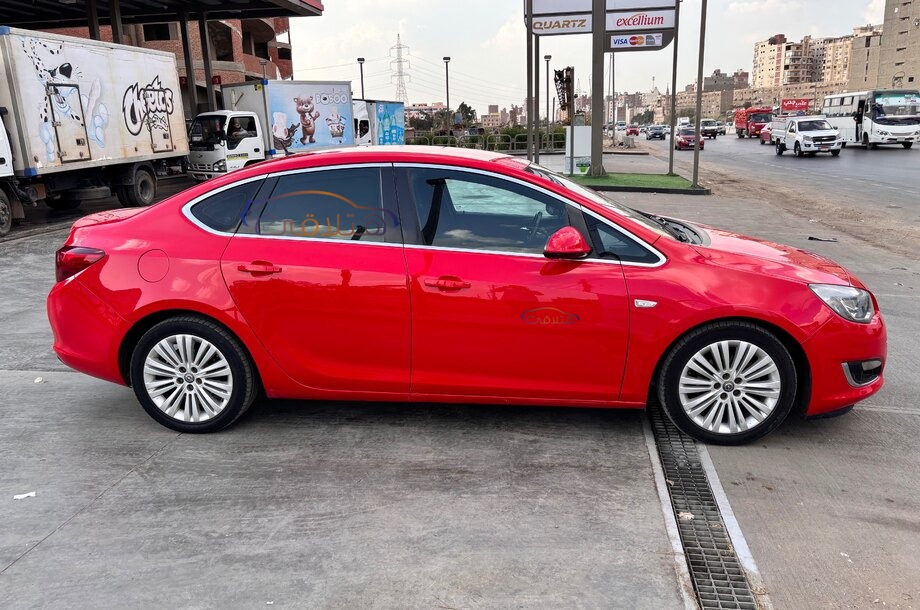 Astra Opel 2015 Dakahlia Red 6907534 - Car for sale : Hatla2ee
