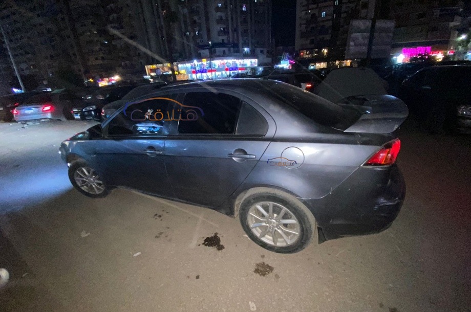 Lancer EX Shark Mitsubishi 2015 Asyut Gray 6907651 - Car for sale : Hatla2ee