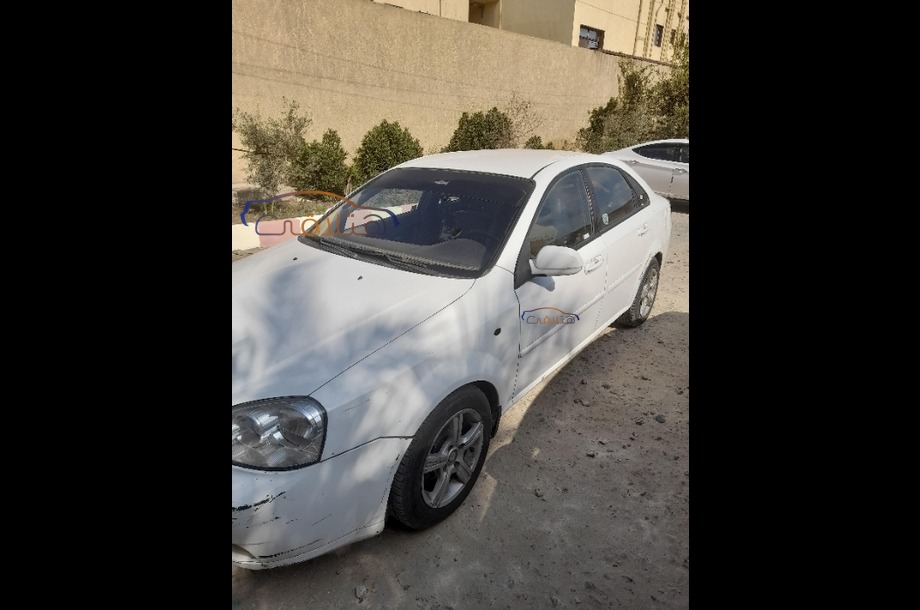Optra Chevrolet 2005 Zagazig White 6907885 - Car for sale : Hatla2ee