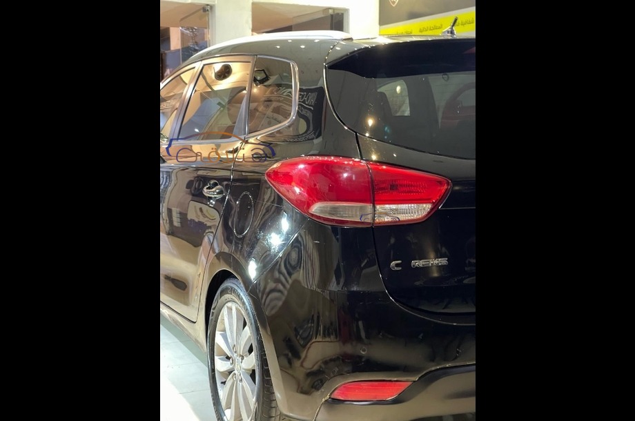 Carens Kia 2015 6 October Black 6910097 - Car for sale : Hatla2ee