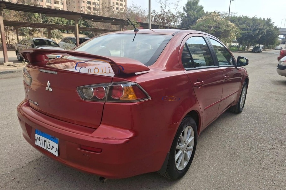 Lancer EX Shark Mitsubishi 2016 Maadi Red 6911388 - Car for sale : Hatla2ee
