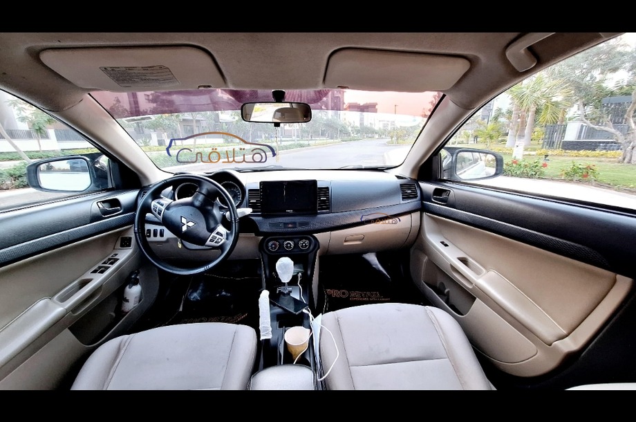 Lancer Mitsubishi 2015 Cairo White 6911667 - Car for sale : Hatla2ee