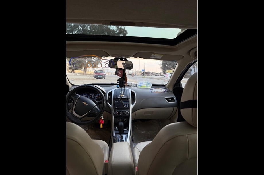 Optra Chevrolet 2021 Warraq Dark blue 6912937 - Car for sale : Hatla2ee