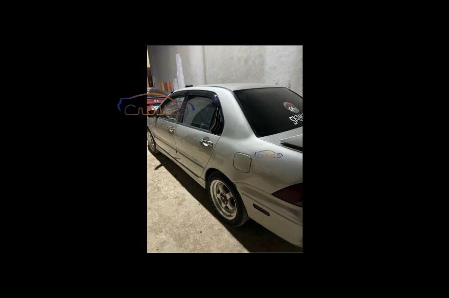 Lancer Mitsubishi 2003 Mansoura Silver 6914014 - Car for sale : Hatla2ee