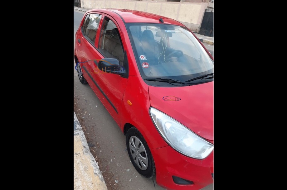 I10 Hyundai 2012 Mohandessin Red 6914572 - Car for sale : Hatla2ee