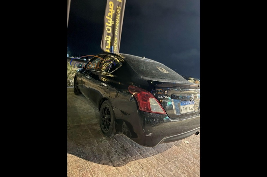 Sunny Nissan 2015 Borg el arab Black 6916086 - Car for sale : Hatla2ee