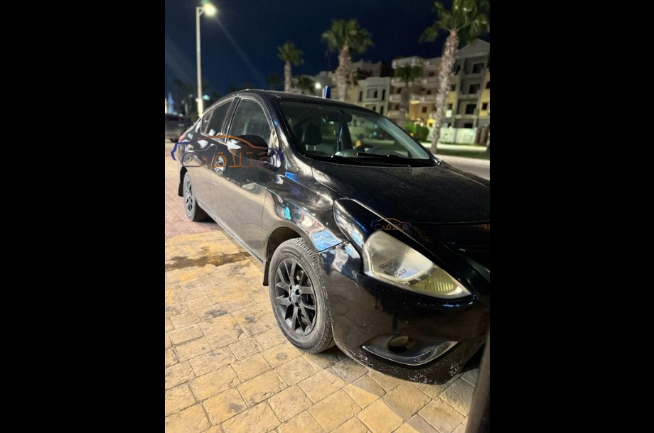 Sunny Nissan 2015 Borg el arab Black 6916151 - Car for sale : Hatla2ee