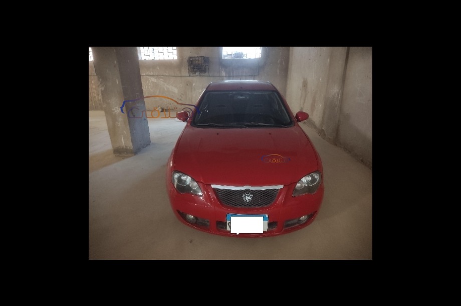 Gen 2 Proton 2013 6 October Red 6916803 - Car for sale : Hatla2ee