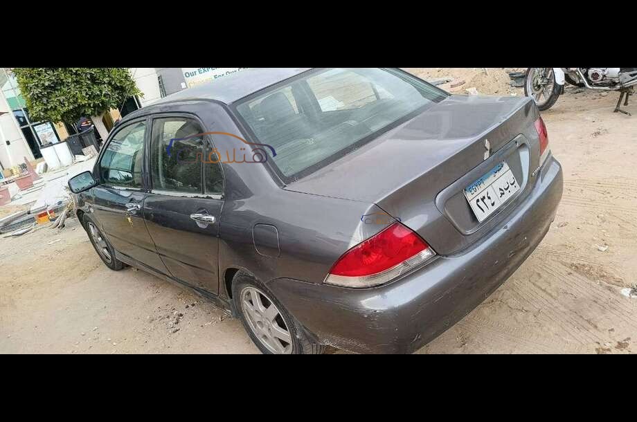 Lancer Puma Mitsubishi 2009 Al Shorouk Dark grey 6920035 - Car for sale ...