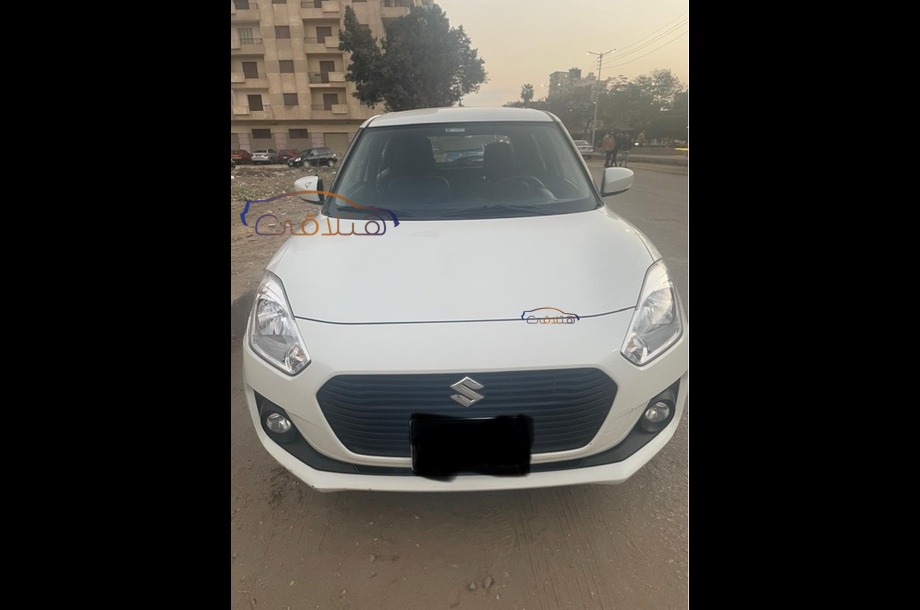 Swift Suzuki Mansoura White 6925006 - Car for sale : Hatla2ee