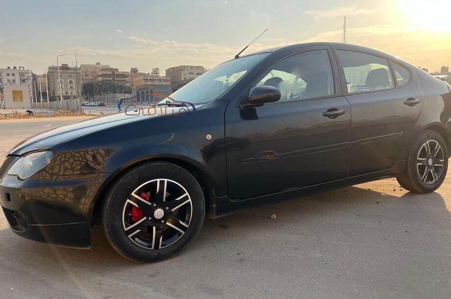 Gen 2 Proton 2010 Mokattam Black 6925551 - Car for sale : Hatla2ee