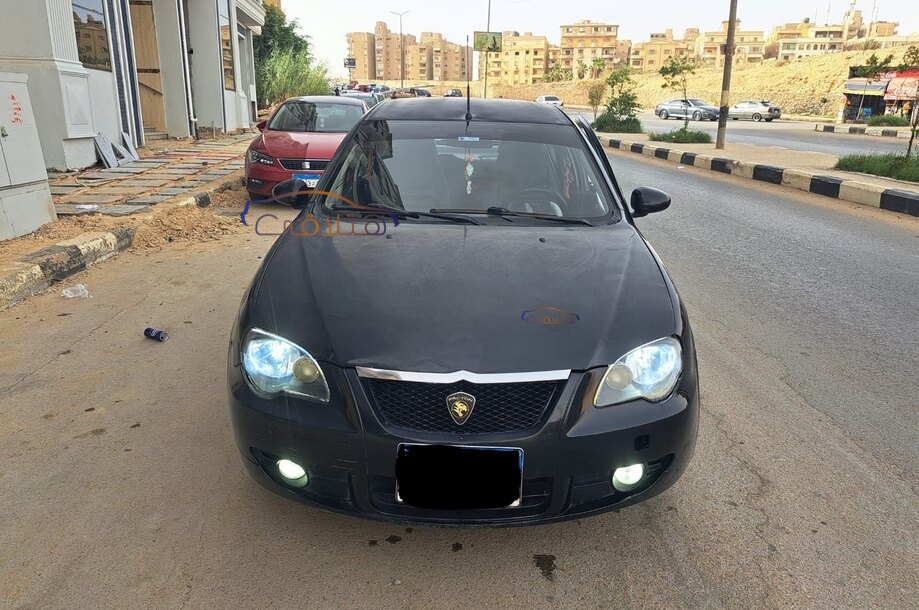 Gen 2 Proton 2010 Mokattam Black 6925551 - Car for sale : Hatla2ee