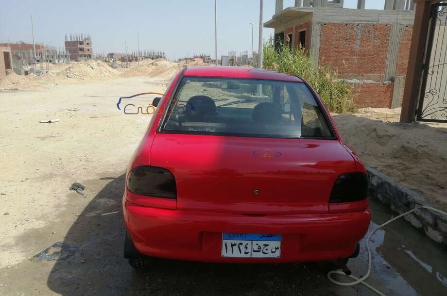 121 Mazda 1997 Alexandria Red 6927768 - Car for sale : Hatla2ee