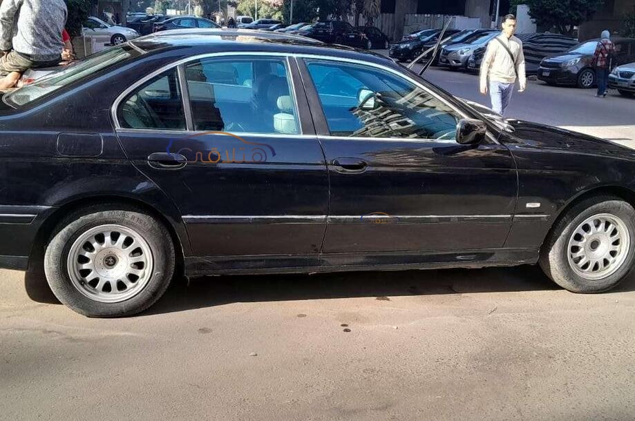 523 BMW 2000 Dokki Black 6928651 - Car for sale : Hatla2ee